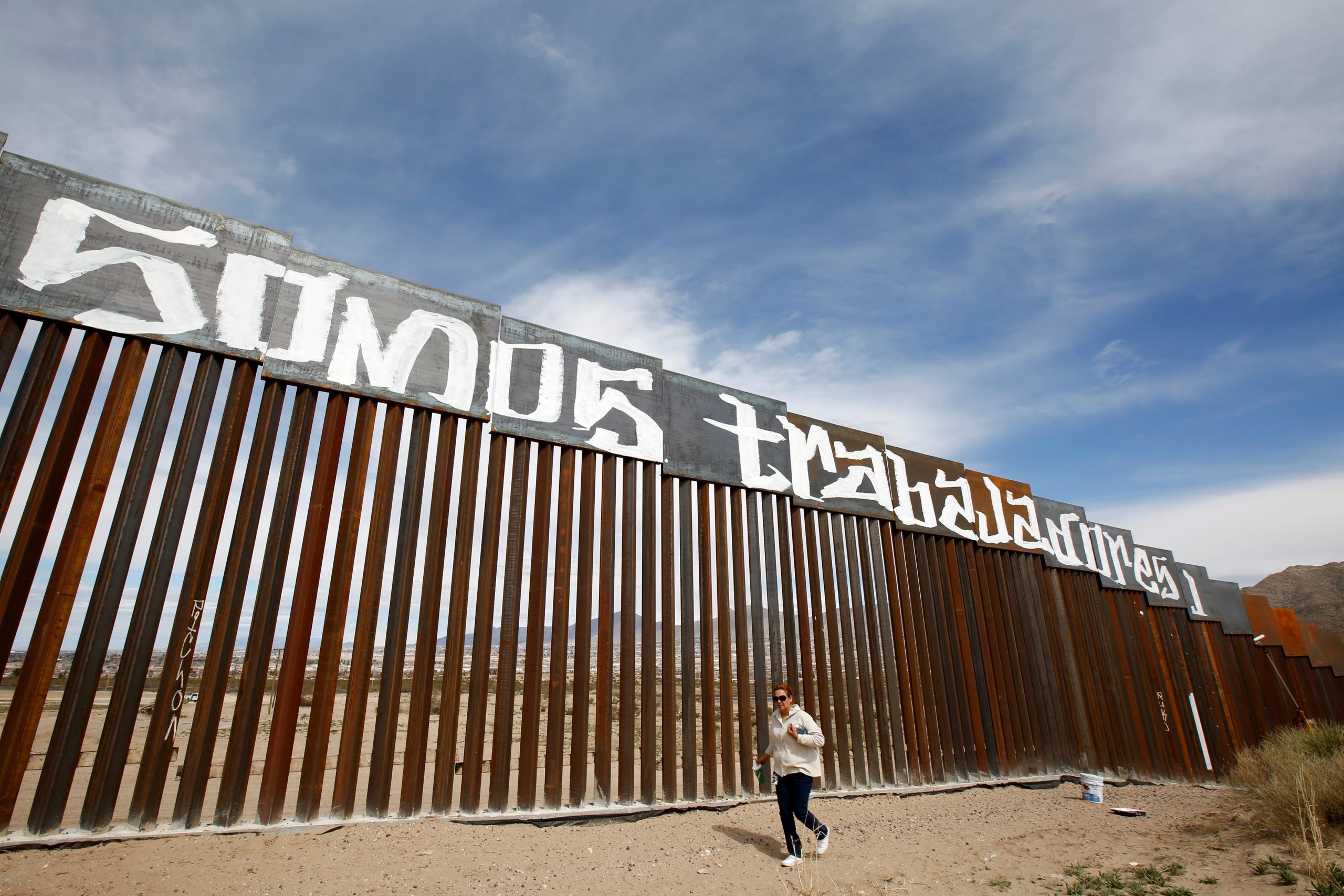 Group of activists paints the U.S.-Mexico border wall between Ciudad ...